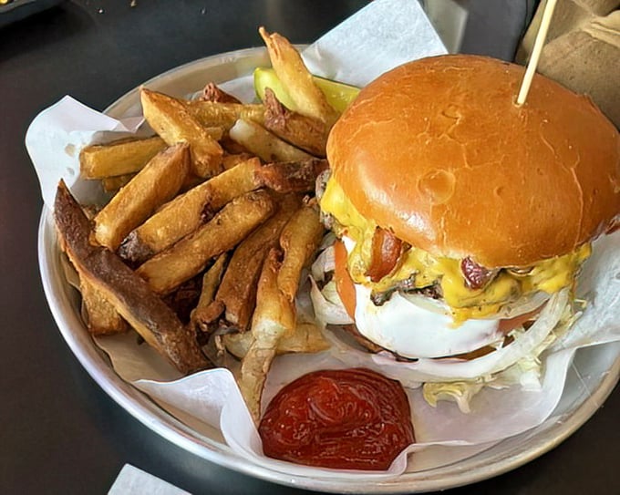 Not just a burger, but a statement of intent. Those hand-cut fries and that pickle spear aren't garnishes – they're necessary reinforcements.