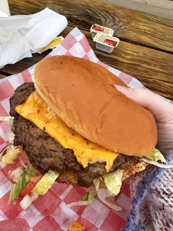 Behold the Cheddar Cheezy in all its glory! That cascade of melted cheese isn't just a topping – it's practically a supporting structure.