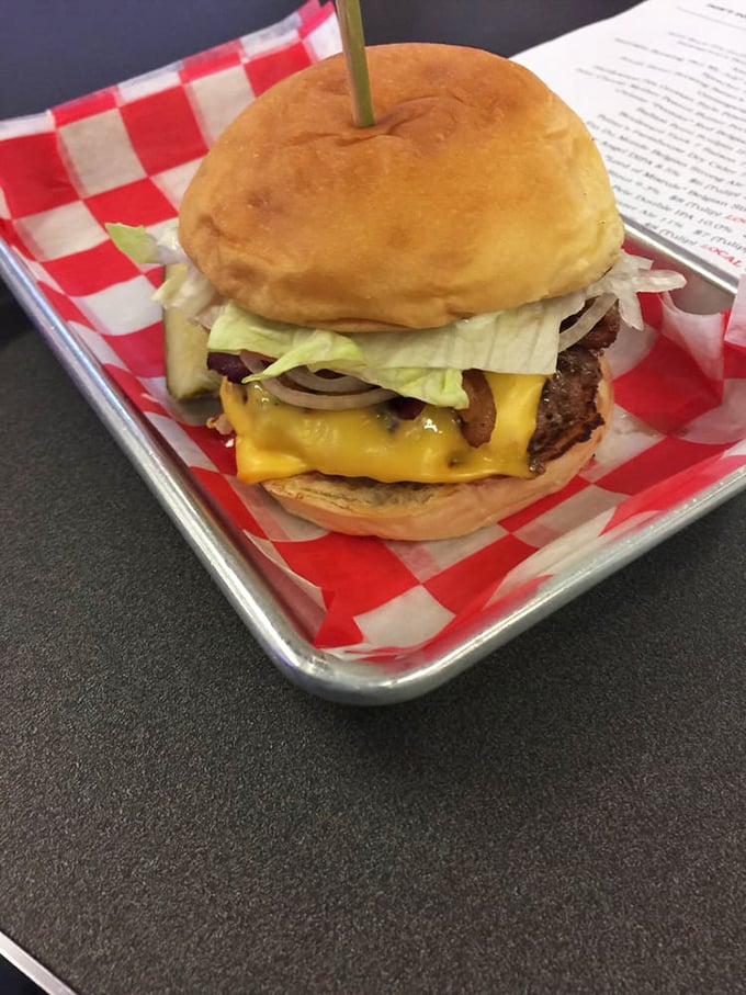 This isn't just a cheeseburger—it's edible architecture with layers of flavor that make your taste buds stand up and salute.