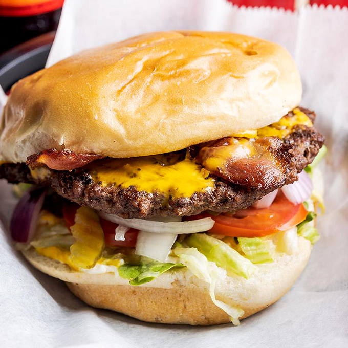 This isn't just a cheeseburger—it's edible architecture where each layer plays its part perfectly in the symphony of flavor.