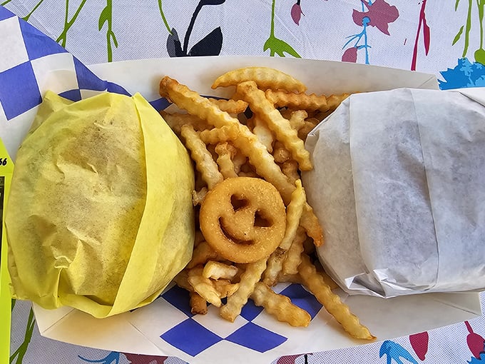 That smiley potato didn't know it would be the highlight of someone's cross-country adventure. Crispy fries and a juicy burger—road trip nirvana achieved.