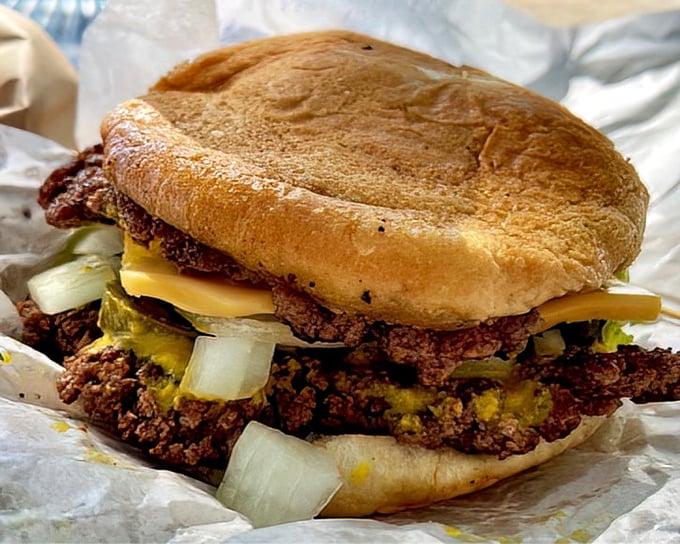 This isn't just a burger—it's edible architecture where each jalapeño adds structural integrity and a kick that'll wake up taste buds you didn't know you had.