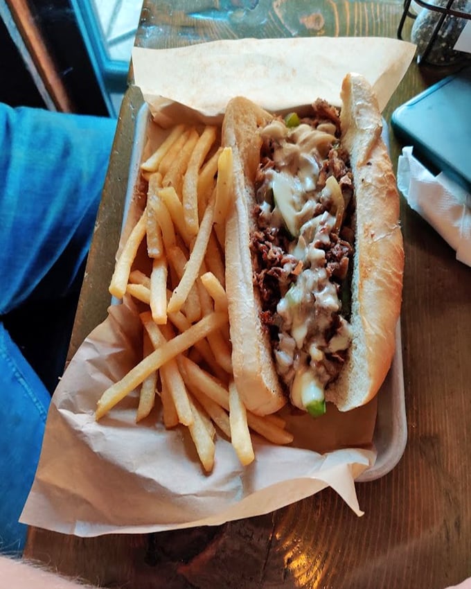 The star of the show – a cheesesteak that makes you question everything you thought you knew about the perfect ratio of meat to cheese to bread.