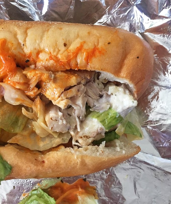 Behold the star of the show! Mama's chicken cheesesteak bursts with tender meat, melted cheese, and fresh veggies, all nestled in a perfectly crusty roll.