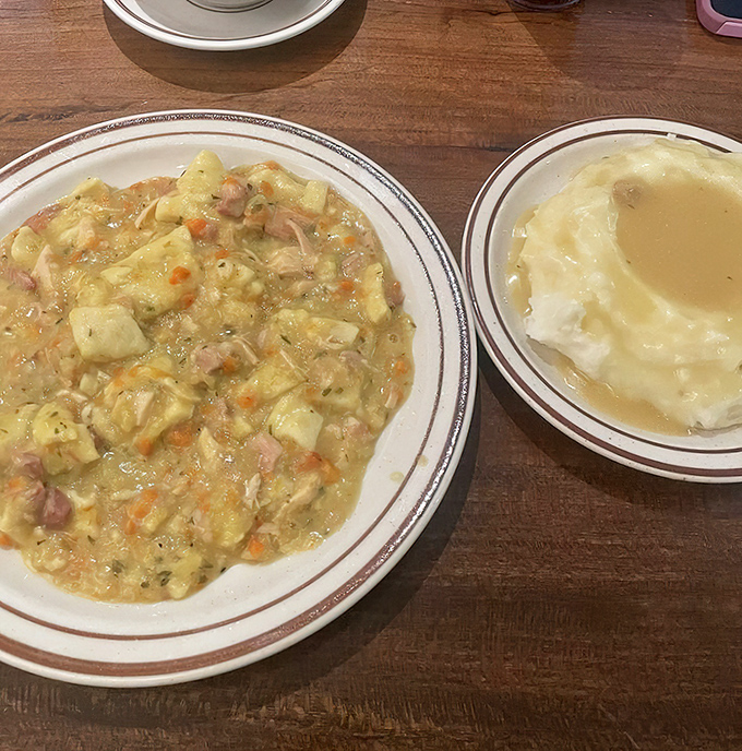 This is Pennsylvania Dutch pot pie – not the hat-wearing, crust-covered impostor, but a glorious stew where square noodles and tender chicken swim in liquid gold.