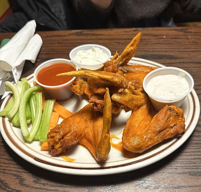 These wings aren't just served—they're presented like the celebrities they are. The sauce-to-meat ratio here is what mathematicians call "perfect."
