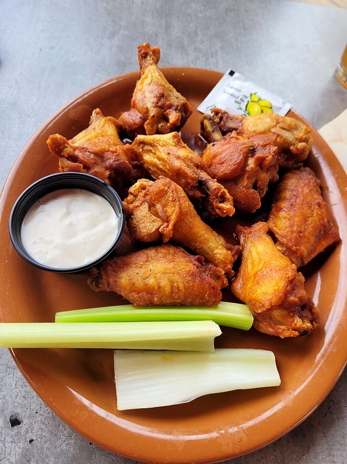 These Nashville wings aren't just crispy—they're the kind of golden-brown perfection that makes you temporarily forget table manners exist.