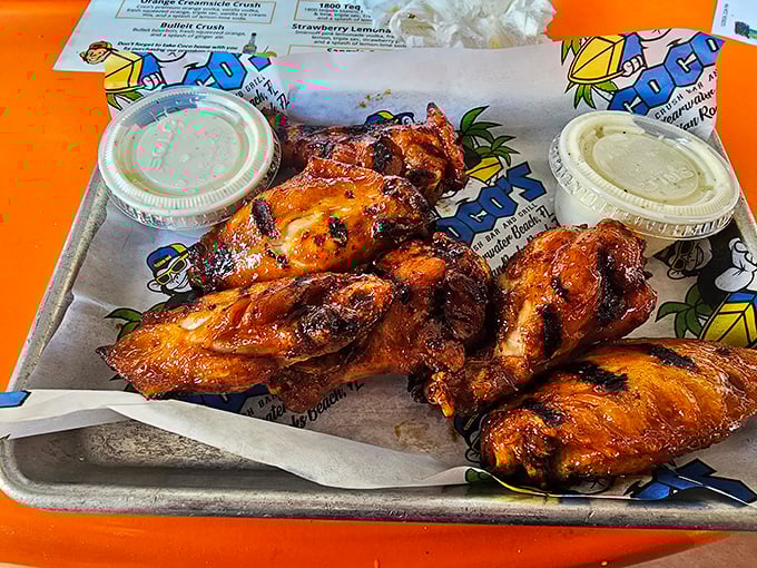 These wings aren't just cooked—they're transformed through some mystical process that turns ordinary chicken into a religious experience worth traveling for.