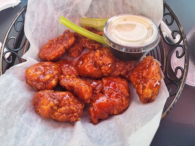 These wings aren't just good, they're life-changing – glistening with sauce that clings to each morsel like it's afraid of missing the party in your mouth.