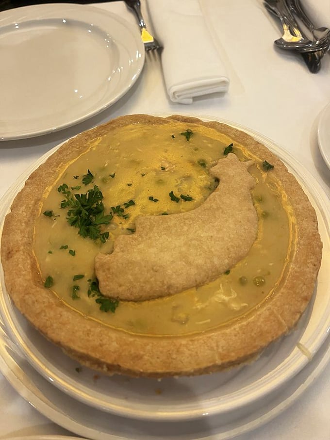Behold the chicken pot pie in all its golden glory! That pastry dome isn't just a crust—it's a portal to comfort food nirvana.