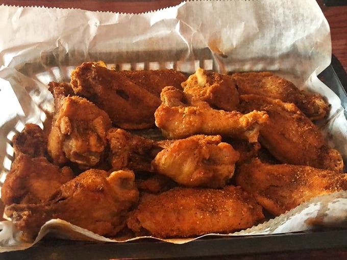 These wings aren't just cooked; they're transformed. Golden-brown perfection with a seasoning that should be classified as a controlled substance.