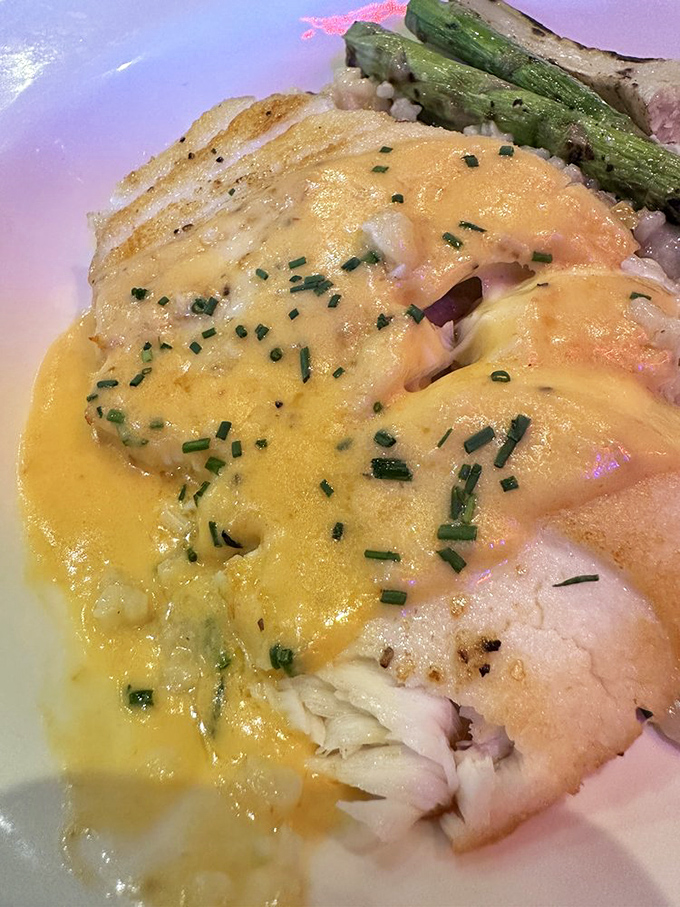 Chilean Sea Bass that's dressed better than most people at a wedding—pistachio risotto and that glistening sauce deserve their own Instagram account.