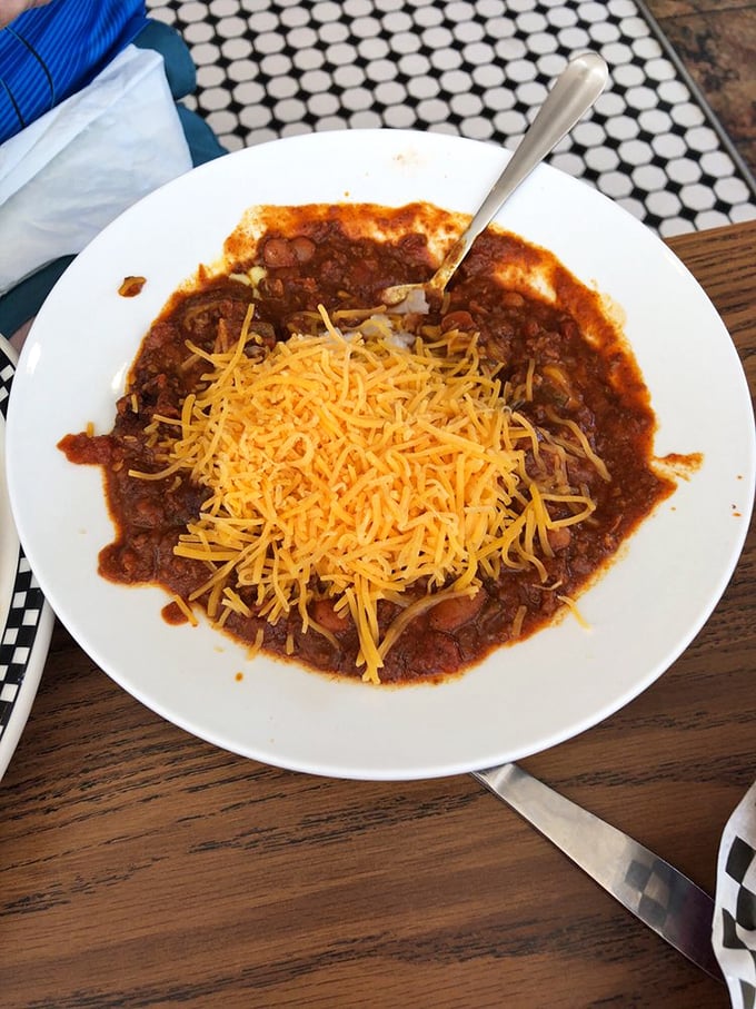 This isn't just chili – it's a spicy time machine topped with enough cheese to make Wisconsin nervous.