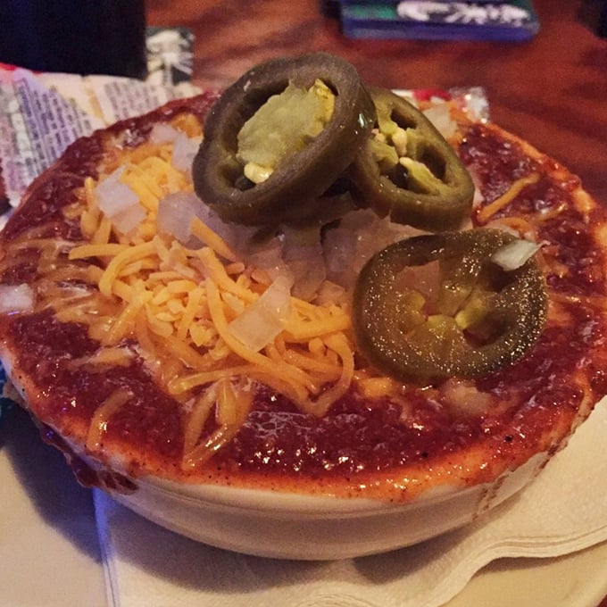 Cincinnati-style chili topped with cheese, onions, and jalapeños – a spicy symphony in a bowl that's worth crossing state lines for.