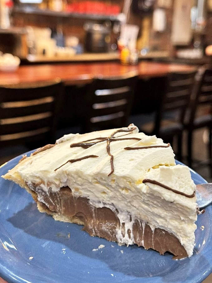 Chocolate cream pie that doesn't just satisfy a sweet tooth—it throws a full-blown party for it. That chocolate-to-cream ratio deserves a Nobel Prize.