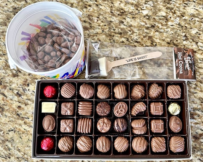 Chocolate soldiers standing at attention in their perfect rows. The "Life is Sweet" paddle isn't just cute – it's stating the obvious here.