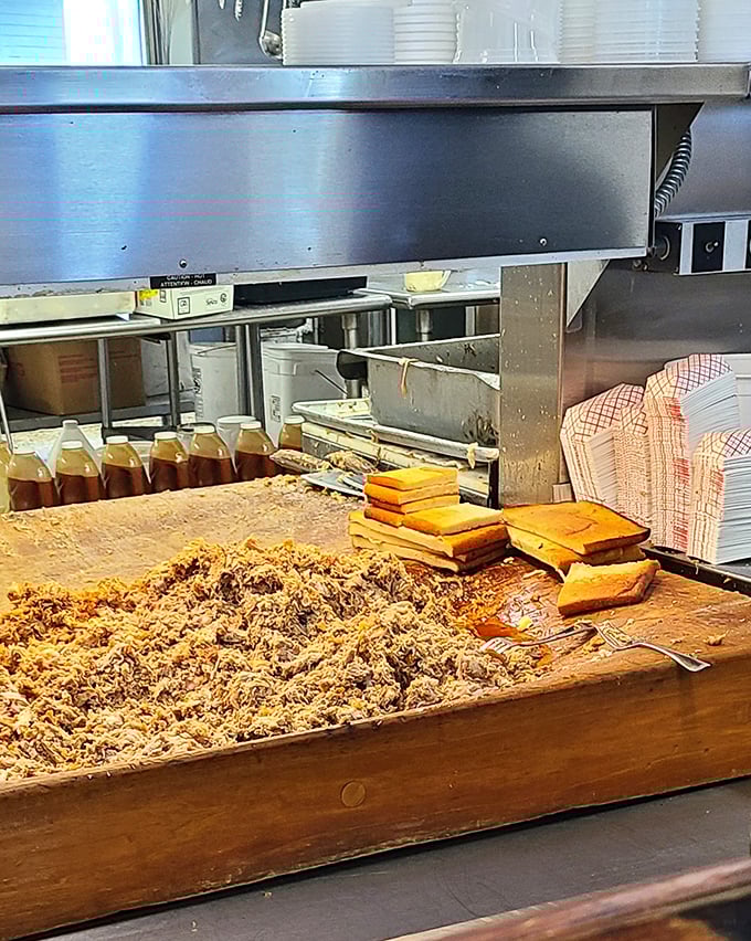 Behold the holy grail of Eastern NC barbecue—chopped whole hog on a well-worn wooden block, with bits of crackling mixed in like hidden treasure.