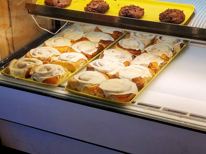 These aren't just cinnamon rolls—they're spiral galaxies of buttery dough and cream cheese frosting that make people set alarms for breakfast.