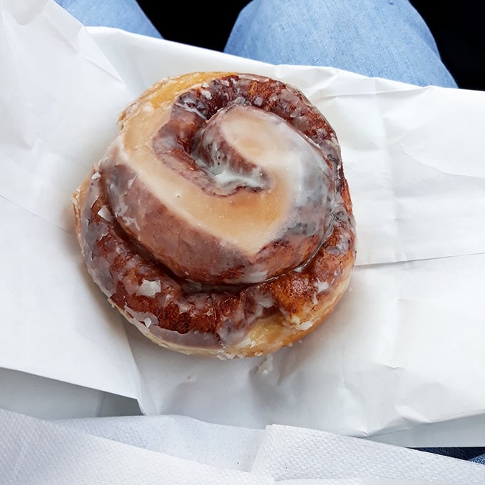 This cinnamon roll isn't just breakfast, it's an event. Layers of spiced dough and rivers of icing that would make even dietitians weak at the knees.