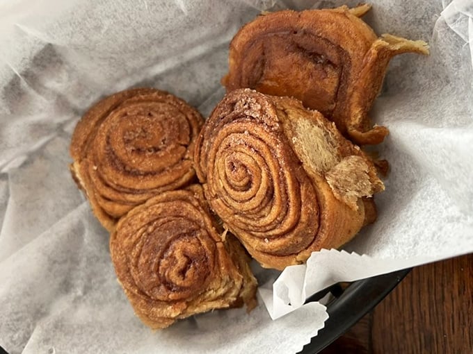 These cinnamon rolls aren't just breakfast—they're an intervention for your taste buds. Spiral-shaped proof that happiness can be baked.