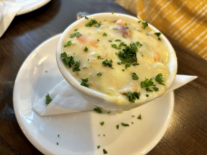 This isn't just clam chowder—it's a creamy bowl of New England tradition that makes you wonder why you'd ever waste stomach space on Manhattan style.