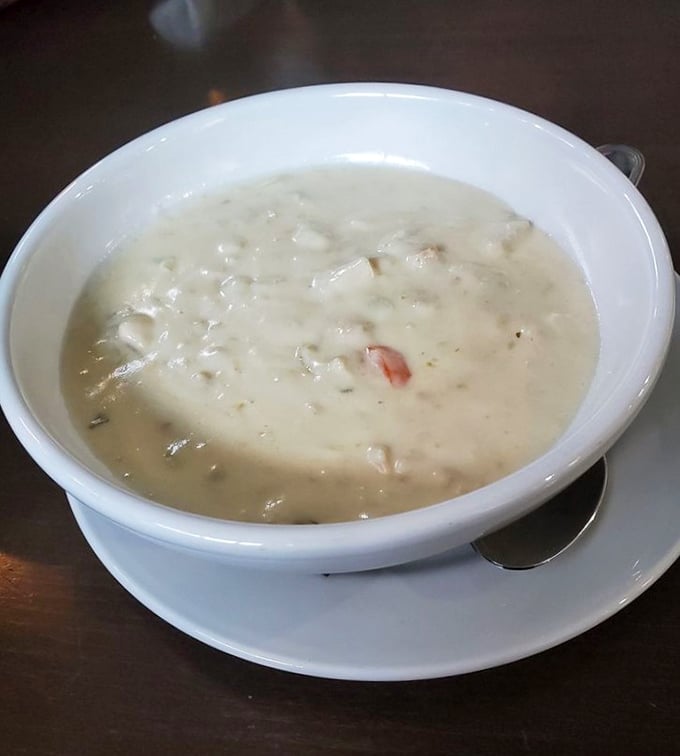 The legendary clam chowder in all its creamy glory – where each spoonful is like a warm hug from the ocean itself.