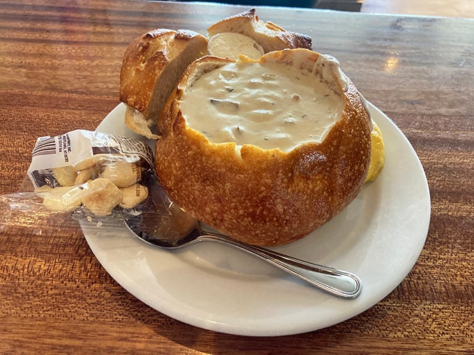 Behold the holy grail—a sourdough fortress cradling creamy clam chowder that makes you question why you've wasted time on lesser versions.