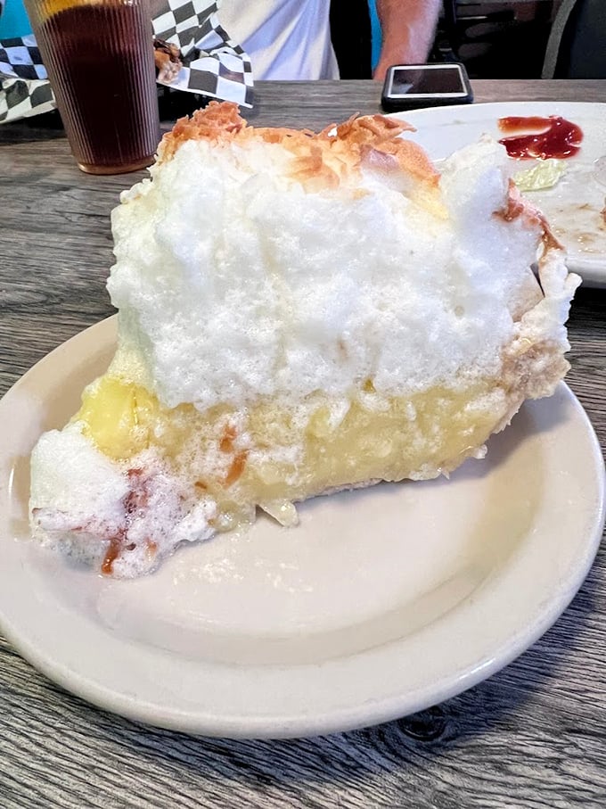 Meet the star of the show – a coconut cream pie so heavenly it deserves its own zip code. That meringue could float away!