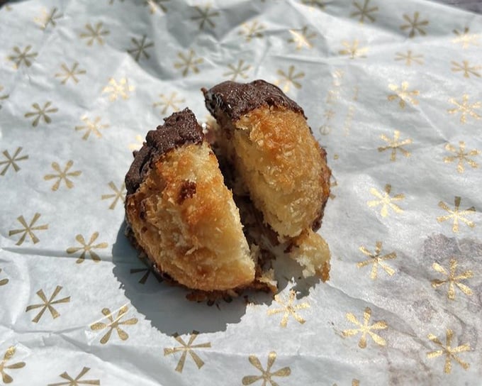 This coconut macaroon isn't just a cookie—it's a tropical vacation for your taste buds, with a chocolate-dipped bottom that's pure genius.