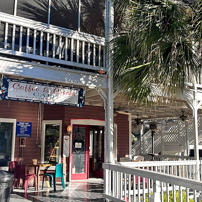 Coffee and Cream Cafe offers the perfect front porch philosophy session spot, where colorful chairs invite conversations that outlast your latte. 