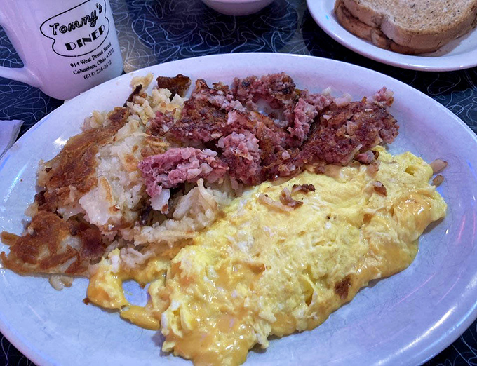 Corned beef hash that doesn't come from a can, paired with eggs cooked exactly how you asked. Breakfast alchemy at its finest.