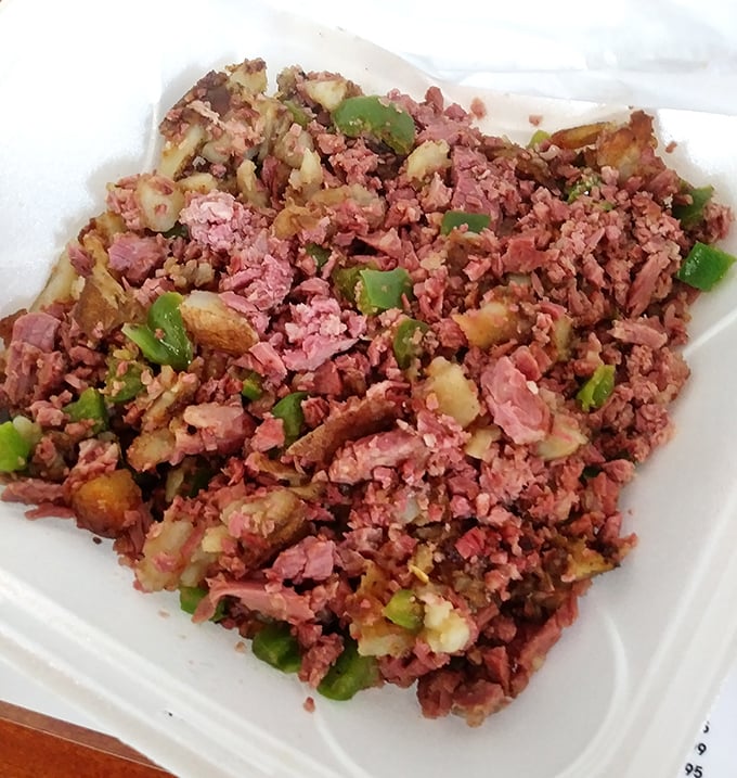 The legendary corned beef hash in its natural habitat. Chunks of meat and potatoes living their best life together—a relationship counselor couldn't create better harmony.
