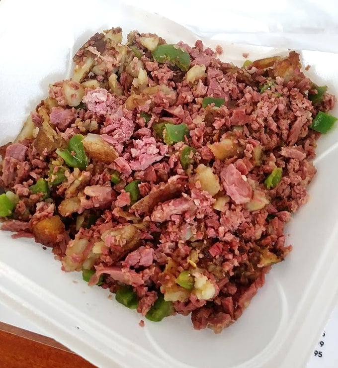 Corned beef hash that doesn't just sit on the plate—it performs. With green peppers adding pops of color like confetti at a breakfast celebration.