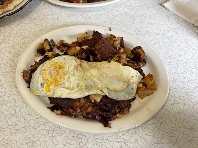 The legendary corned beef hash that launched a thousand road trips. Those crispy edges and perfectly runny eggs are worth crossing county lines for.