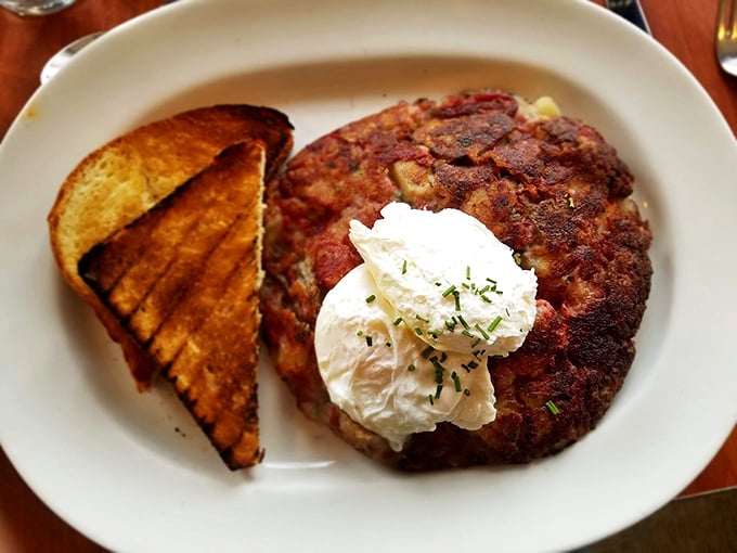The holy grail of breakfast – corned beef hash with a dollop of heaven on top. This isn't just breakfast; it's an edible love letter to morning.