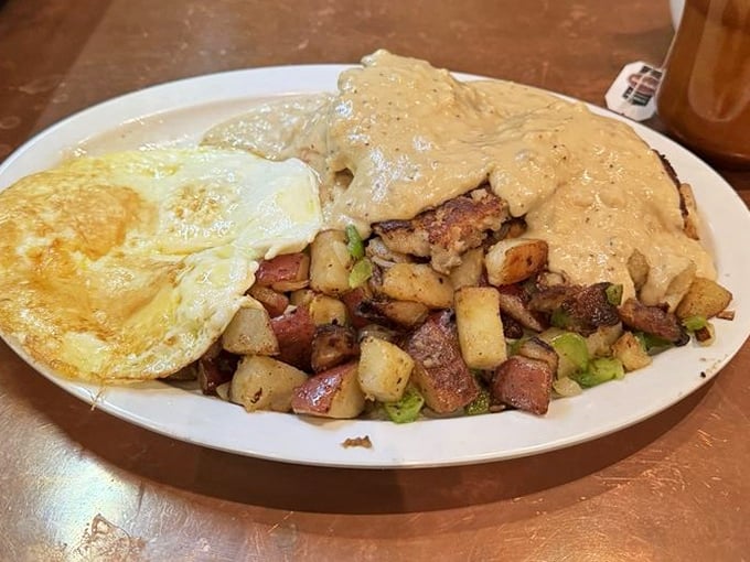 Behold the Country Boy Breakfast: a magnificent plate that transforms morning hunger into pure breakfast bliss and satisfaction.
