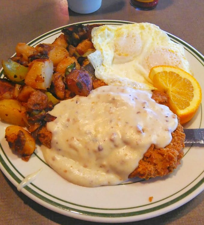 Country fried steak that deserves its own zip code – crispy exterior, tender meat, and gravy that would make your grandmother both jealous and proud.