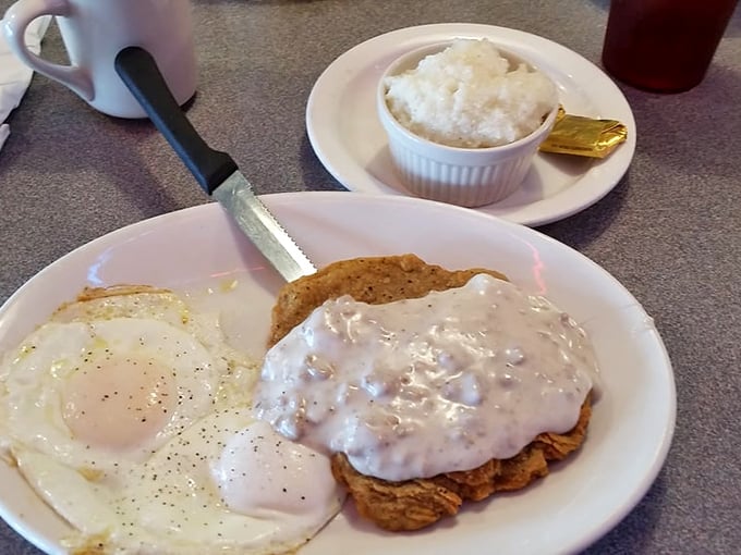 Country fried steak smothered in gravy – comfort food that hugs you from the inside. Paired with eggs and grits, it's the breakfast trifecta.