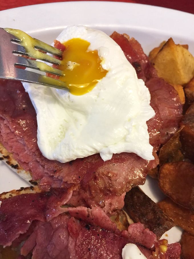 Country ham and eggs—where Virginia tradition meets breakfast perfection. That runny yolk is nature's most perfect sauce.
