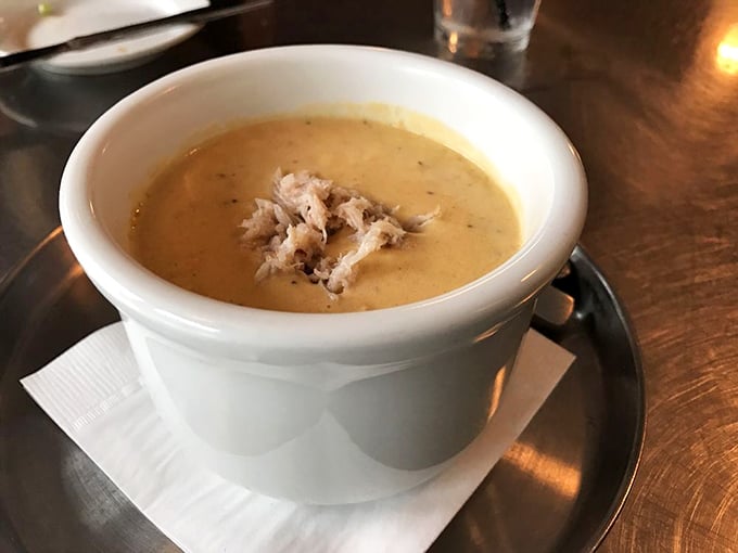 Liquid gold in a cup! This crab bisque isn't just soup – it's a warm, creamy hug from the Delaware Bay itself.