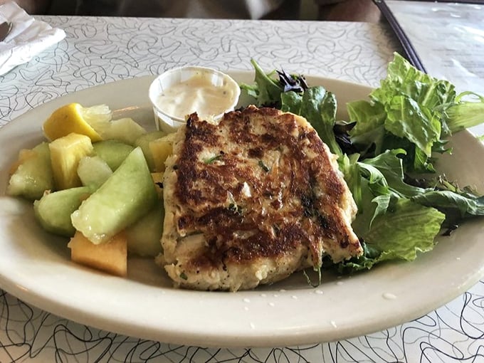 Golden-brown perfection on a plate—this crab cake isn't playing games. All crab, minimal filler, and a reminder of why we fell in love with seafood in the first place.