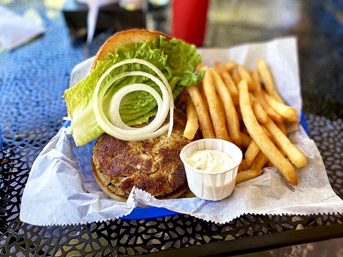 The star of the show! This crab cake sandwich isn't hiding behind fancy garnishes—just pure, lump blue crab meat with a golden crust.