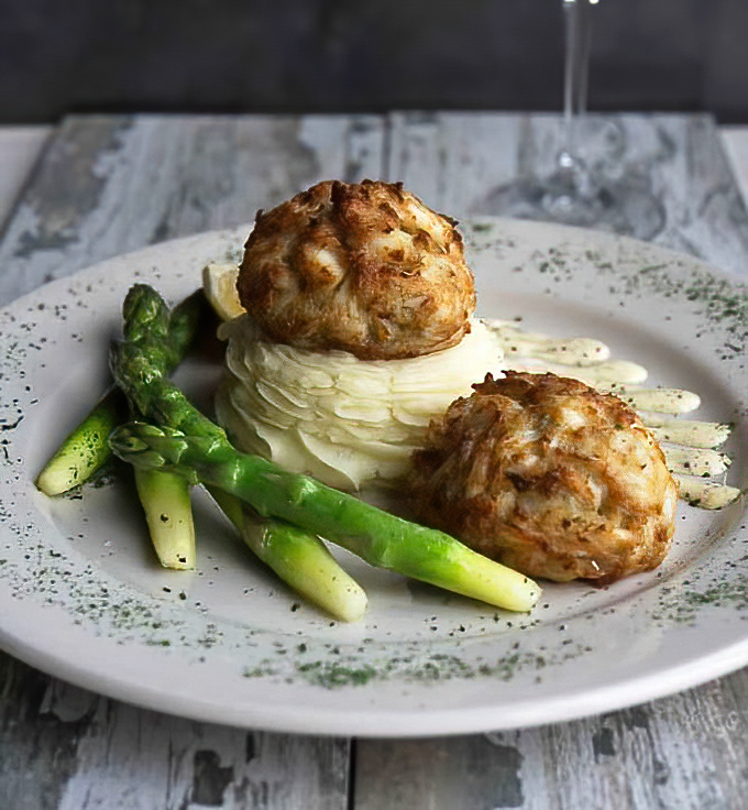 Not all heroes wear capes—some come broiled to golden perfection atop mashed potatoes. These crab cakes contain so much jumbo lump meat, they're practically a shellfish reunion.