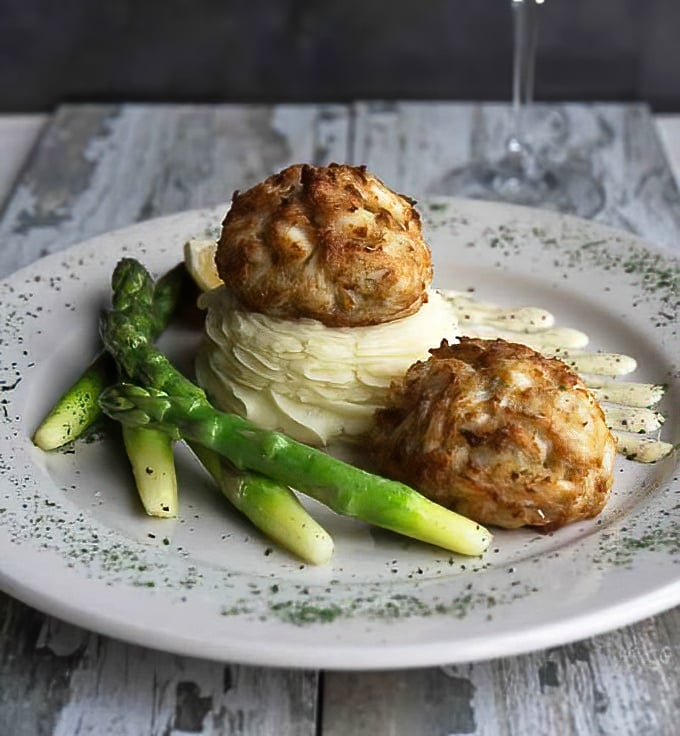Not all heroes wear capes—some come broiled to golden perfection atop mashed potatoes. These crab cakes contain so much jumbo lump meat, they're practically a shellfish reunion.