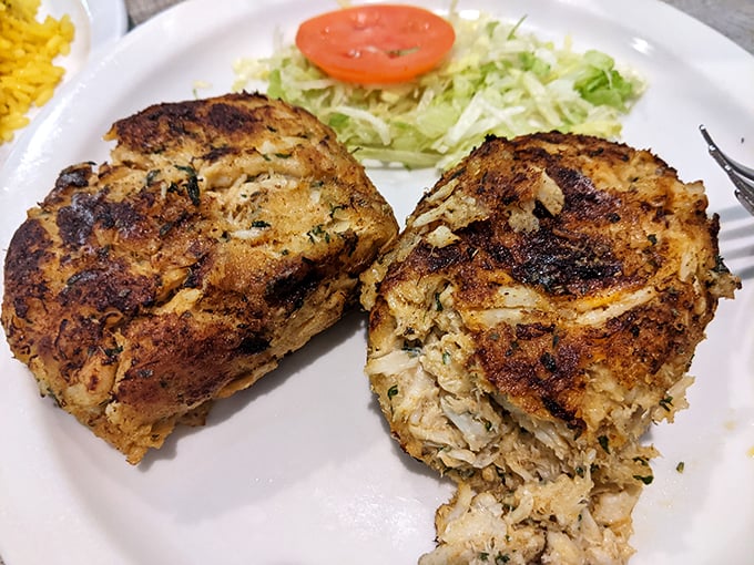These golden-brown crab cakes aren't just cooked, they're crafted—crispy exterior giving way to tender, flavorful seafood within.