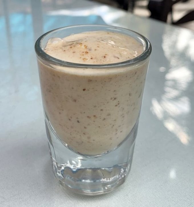 Behold the legendary date shake—tiny speckles of nature's candy suspended in creamy paradise. Worth every mile of your desert pilgrimage.