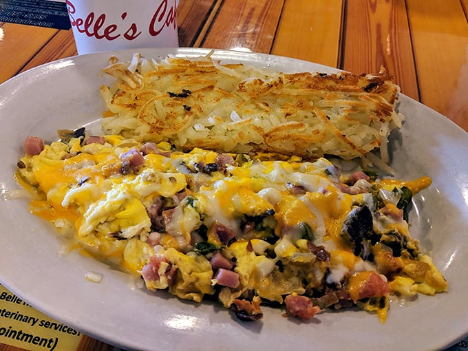 This scramble doesn't just have ham—it's having a party with melted cheese and crispy hash browns that weren't invited but showed up anyway.