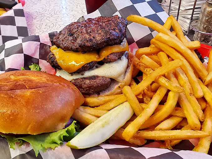 This isn't just a burger; it's a towering monument to beef that requires jaw gymnastics and possibly a post-meal nap. Worth every delicious calorie.