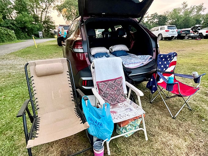 The ultimate movie fort for grown-ups. SUV tailgates transform into cozy viewing nests complete with pillows and blankets.