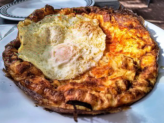 Behold the Dutch baby in all its puffy glory! This golden masterpiece with its crispy edges and that perfect sunny-side-up egg deserves its own parade.